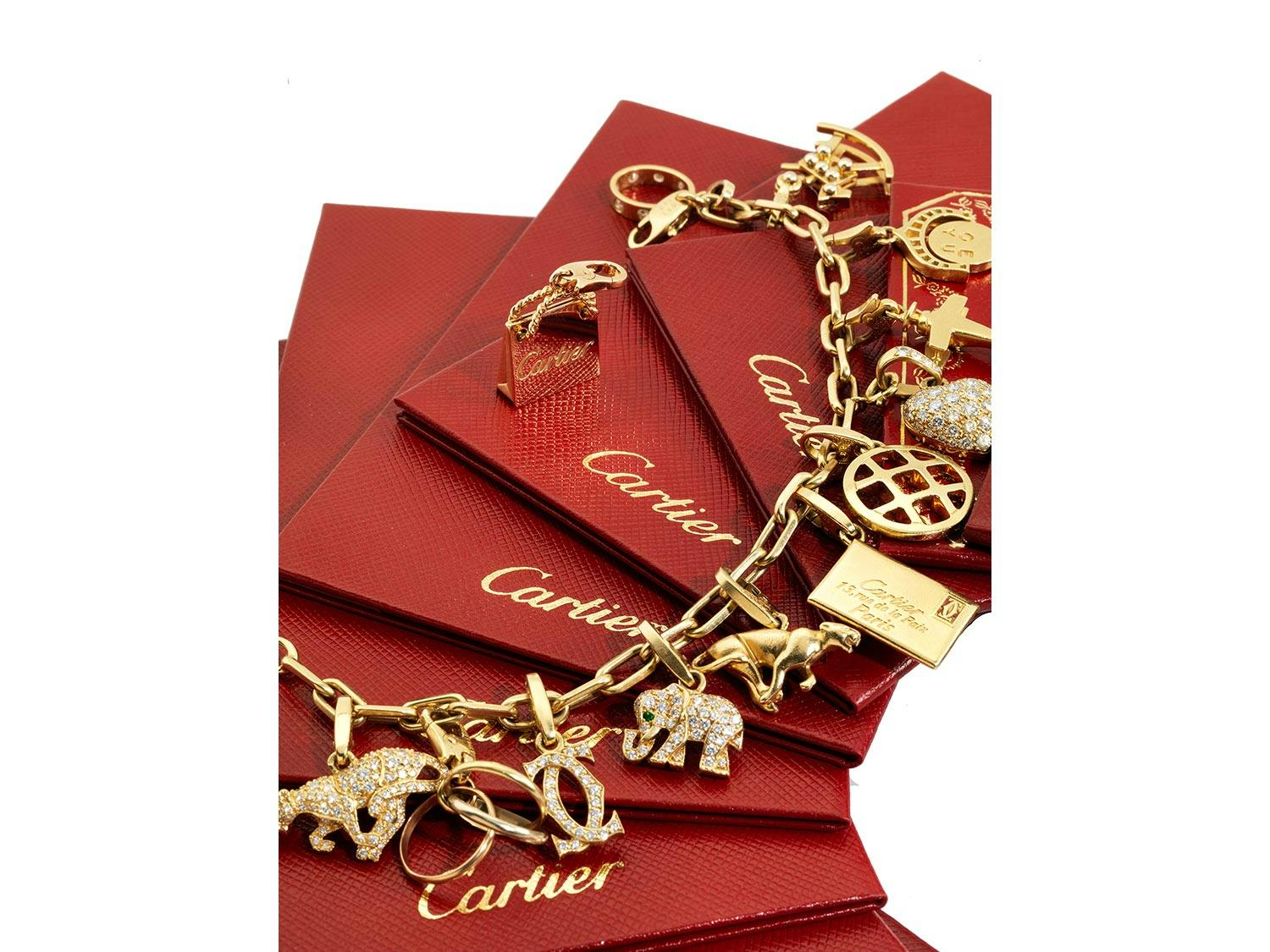 Charm bracelet with 13 charms by Cartier Hampel Fine Art Auctions